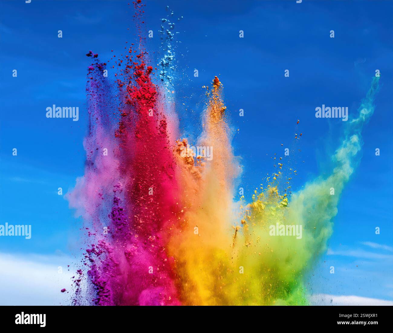 Clouds of colorful powders burst into the air, celebrating the joyful ...