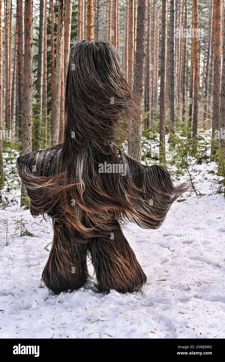 Traditional Kukeri performers dressed in thick long hair goat fur ...