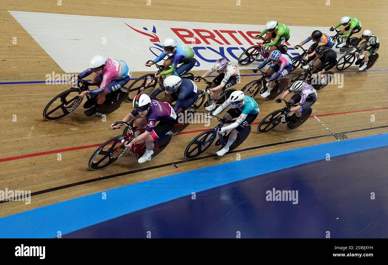 Riders take part in the Women's Scratch race qualification on day one ...