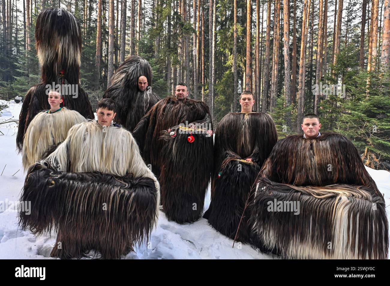 Traditional Kukeri performers dressed in thick long hair goat fur ...