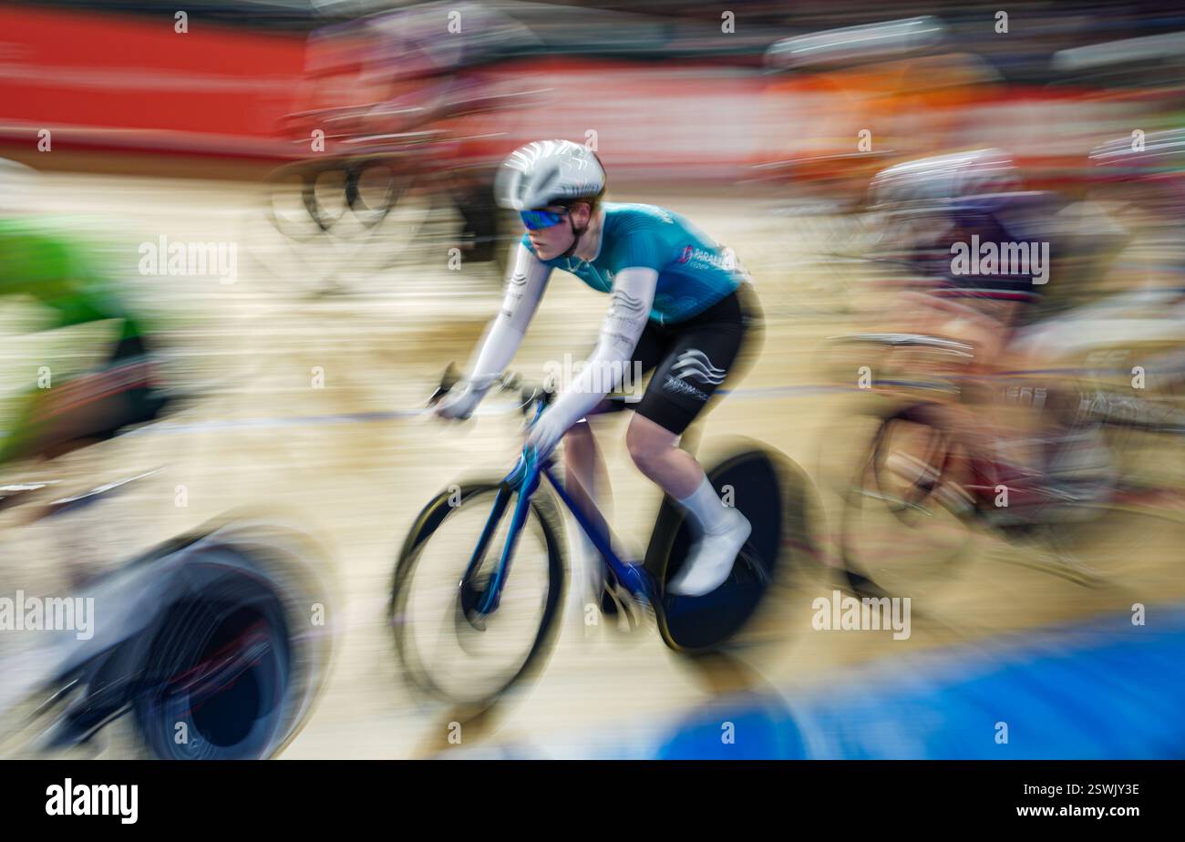 Riders take part in the Women's Scratch race qualification on day one ...