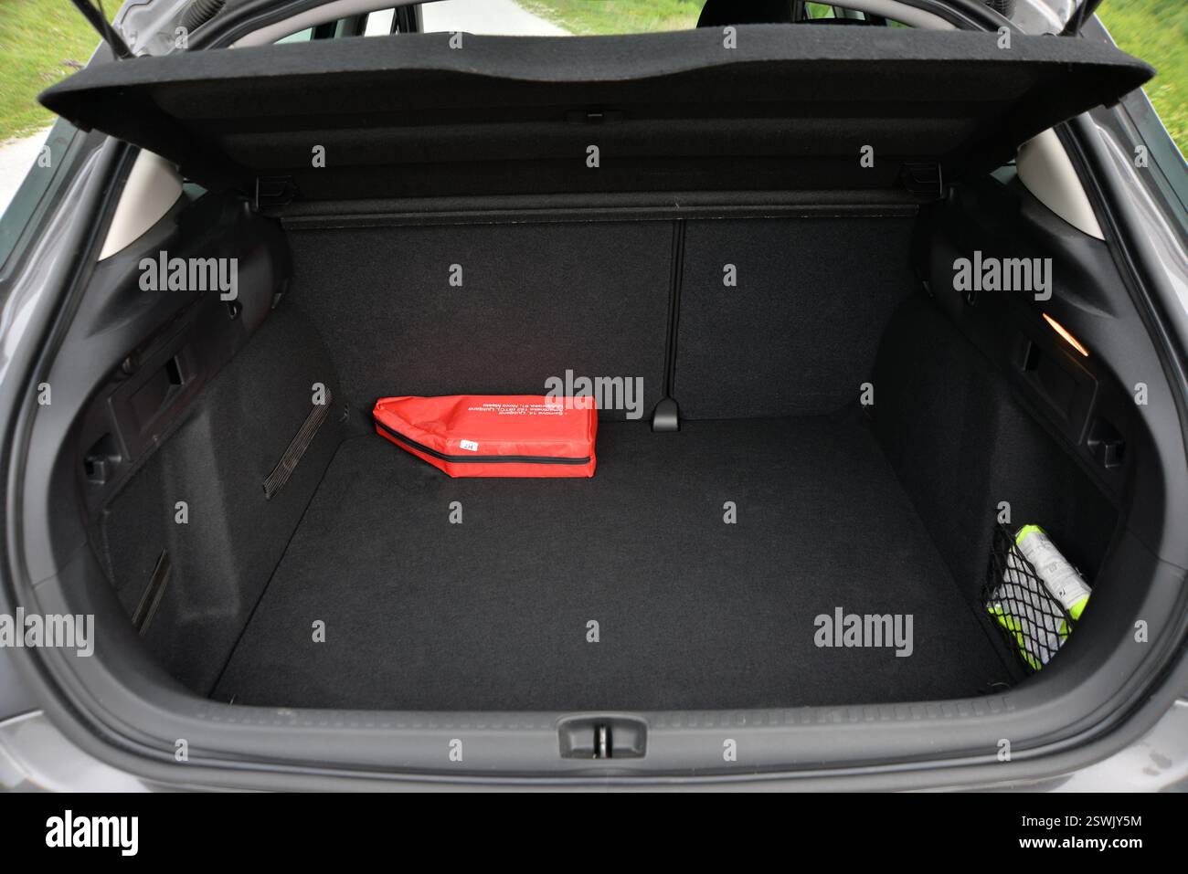 Empty car trunk with first aid kit and storage net Stock Photo - Alamy
