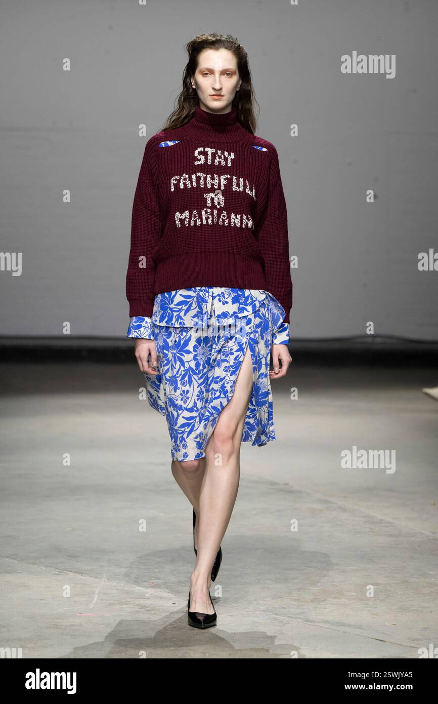 A model walks on the runway during the SS Daley Ready to Wear Fashion ...