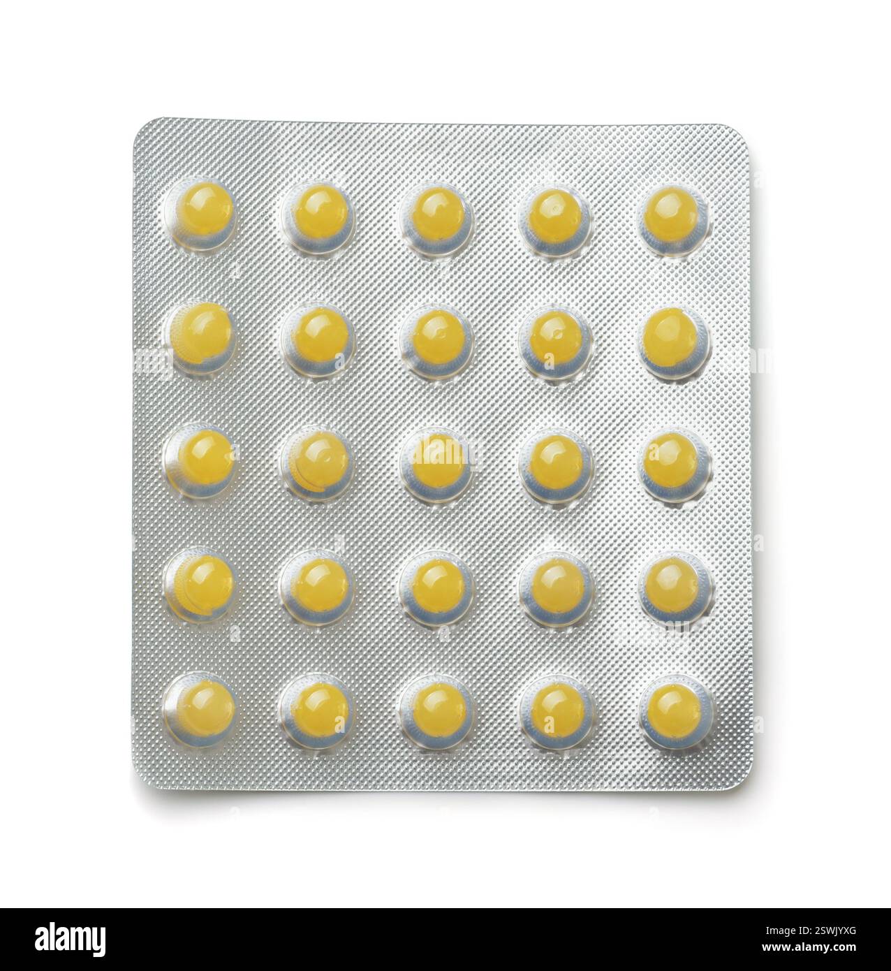 Top view of round yellow capsules in blister pack isolated on white ...