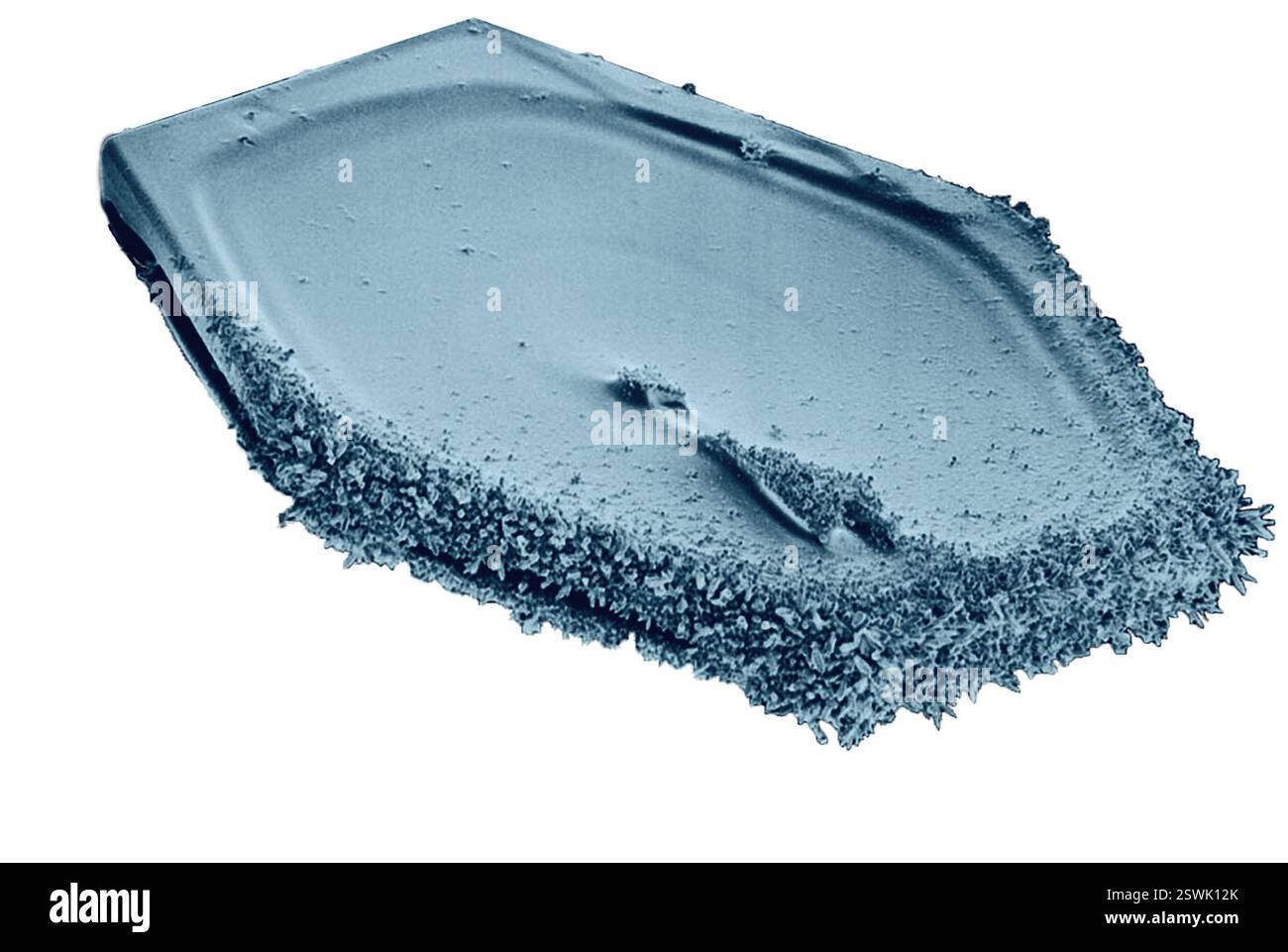 Rimed hexagonal snow crystal. Rime is a white ice that forms when the ...