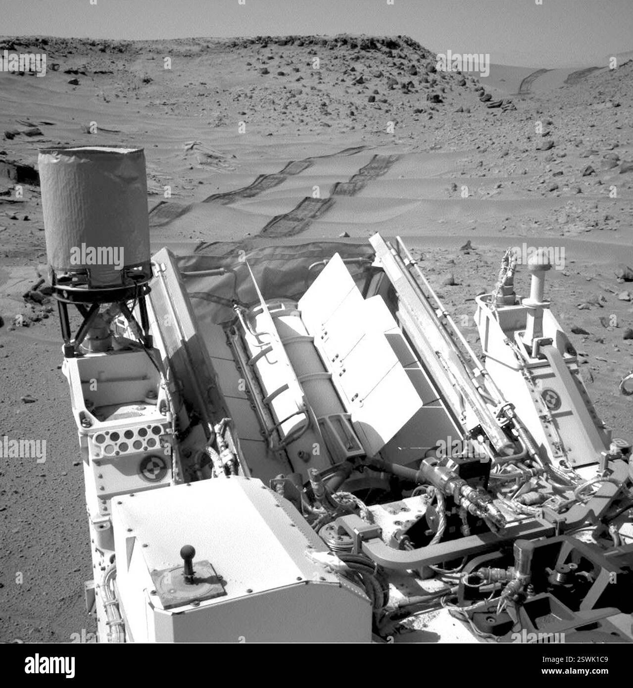 The Curiosity Mars rover sees the track marks it made as it passed ...