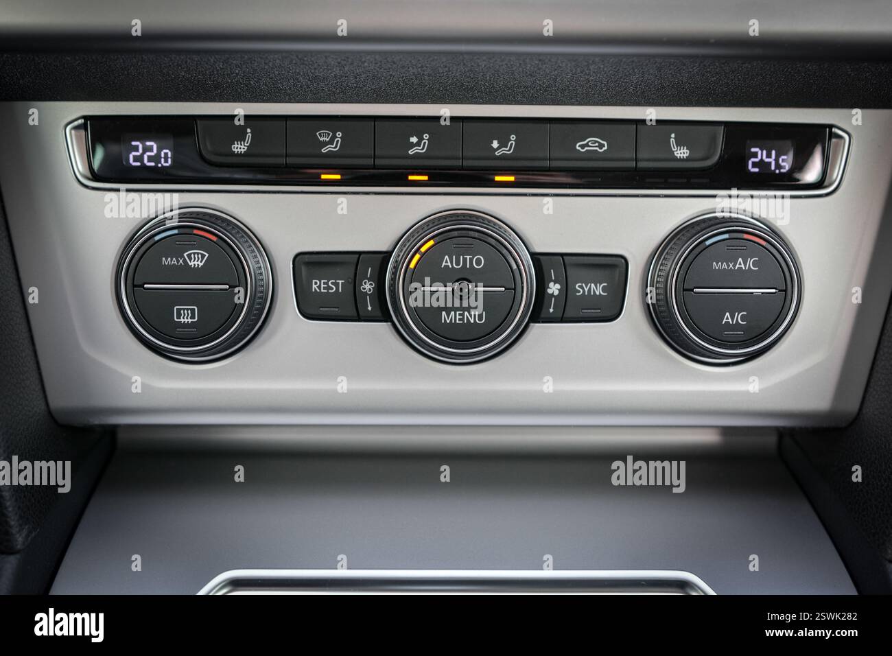 Car climate control panel with temperature display and buttons for ...