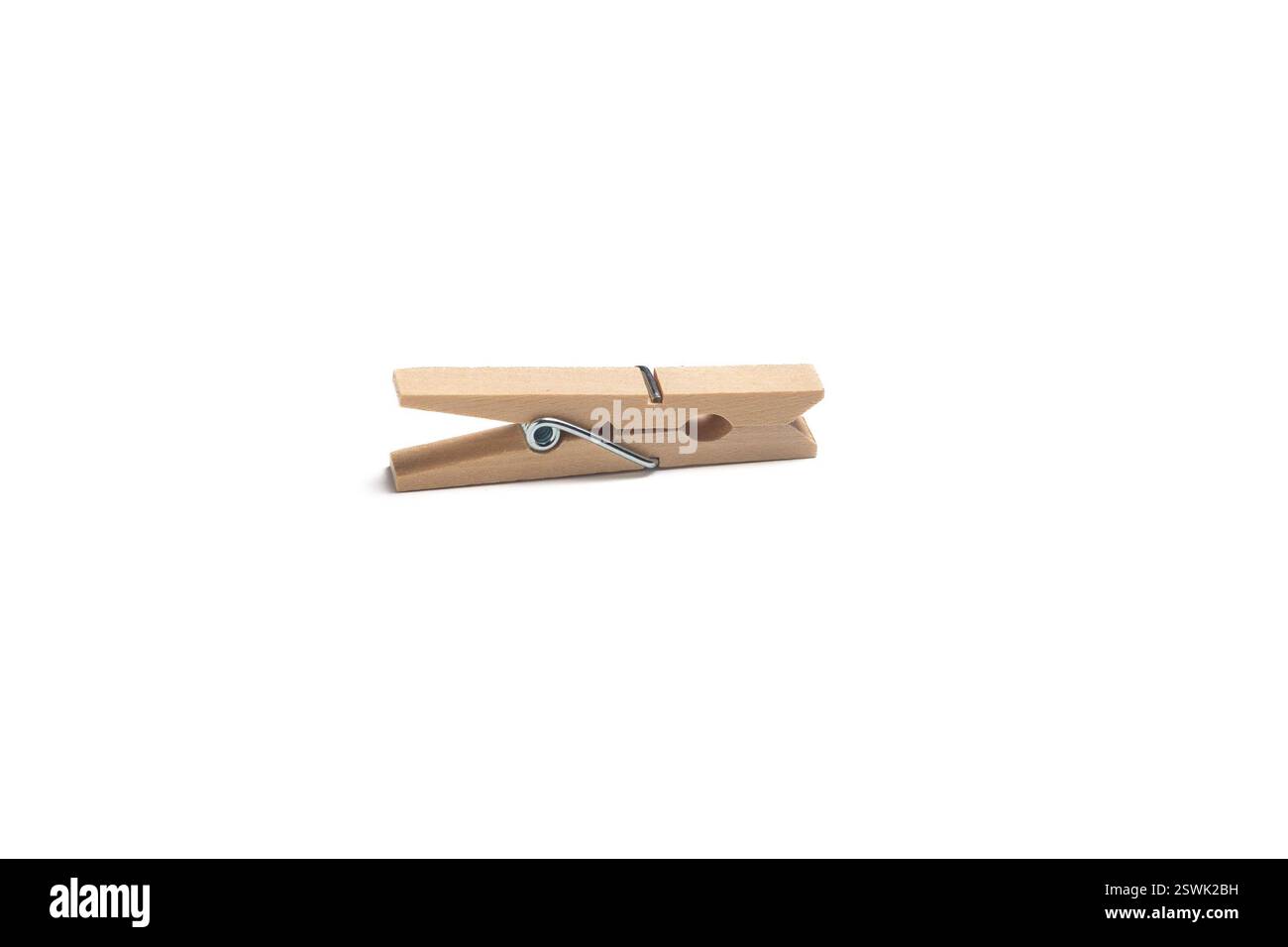 Wooden clothes peg isolated on white background Stock Photo - Alamy