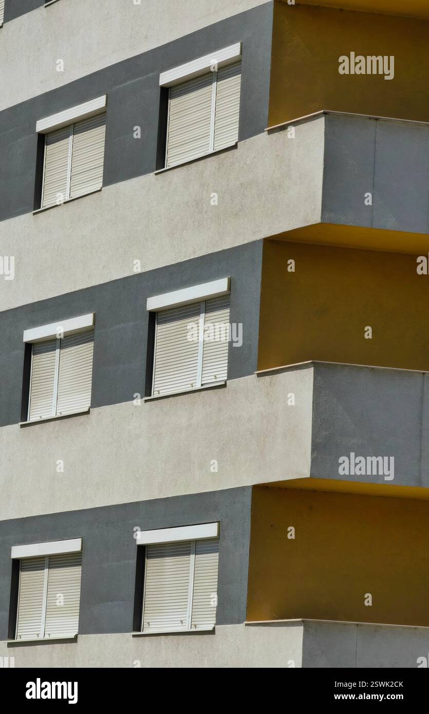 A striking architectural composition, with balconies and closed windows ...