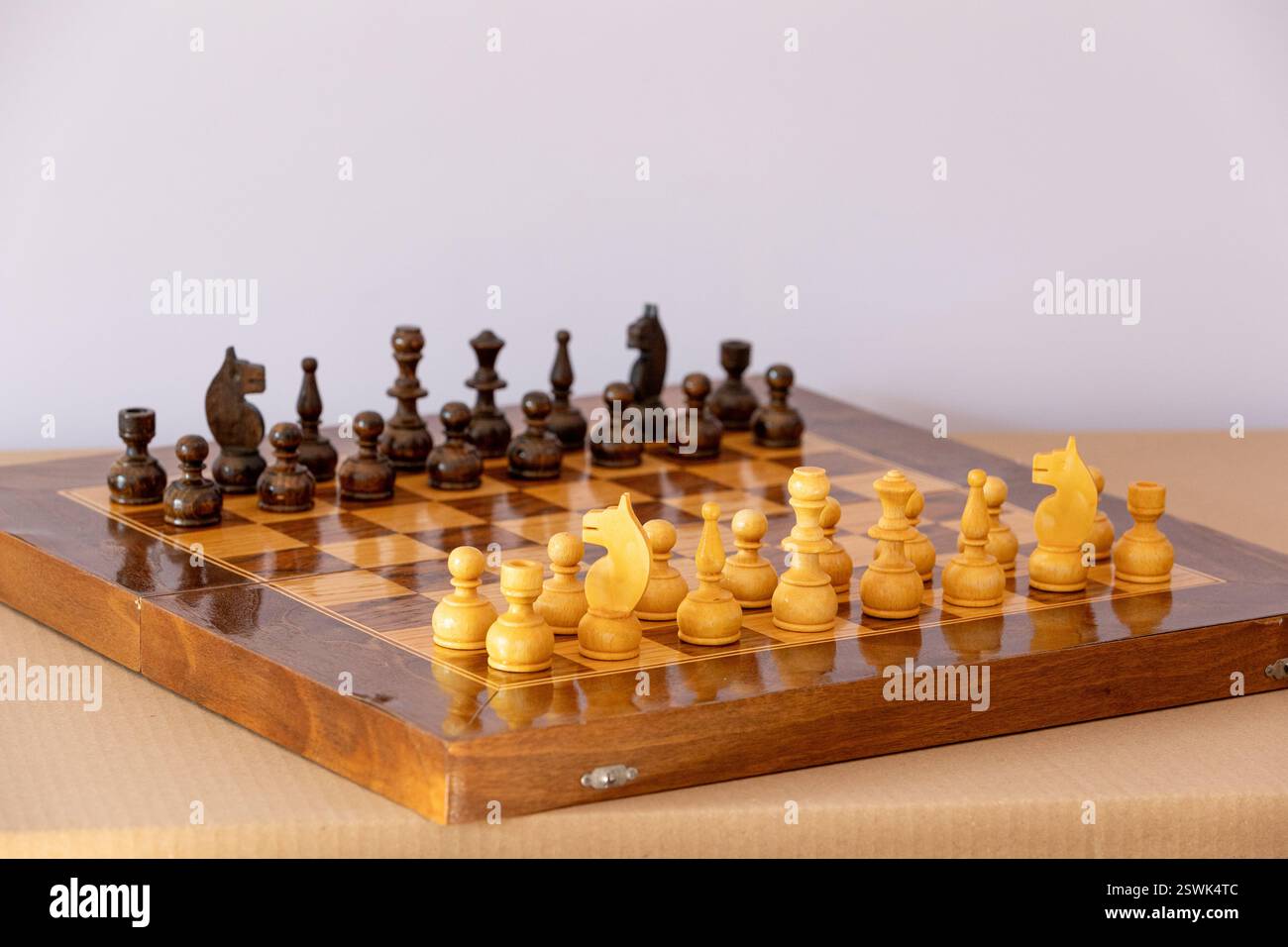 Wooden chess pieces on the chessboard. Intellectual game Stock Photo ...