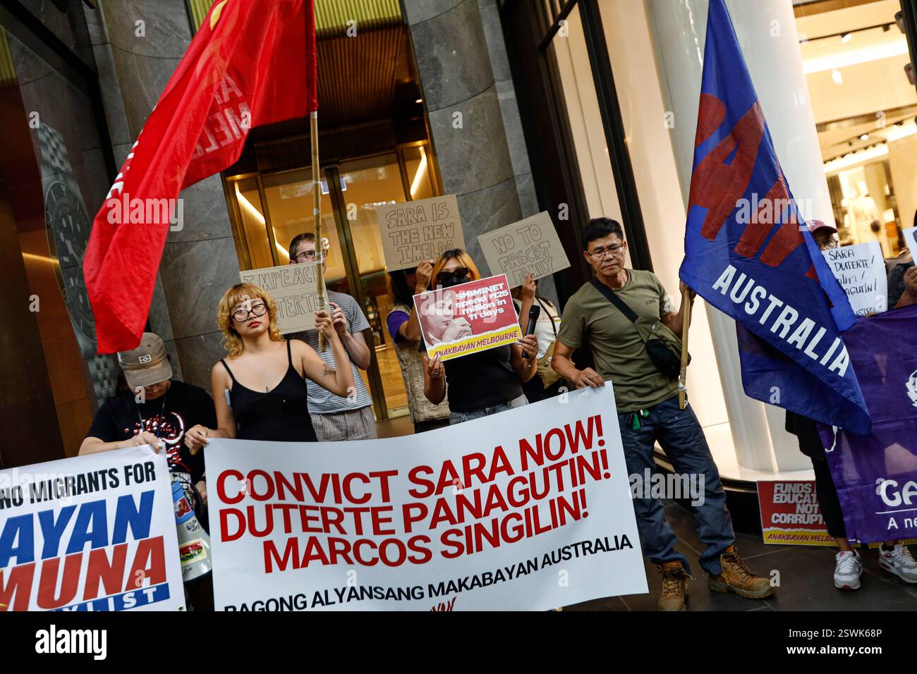 Protesters hold banners and placards during the Black Friday protest ...