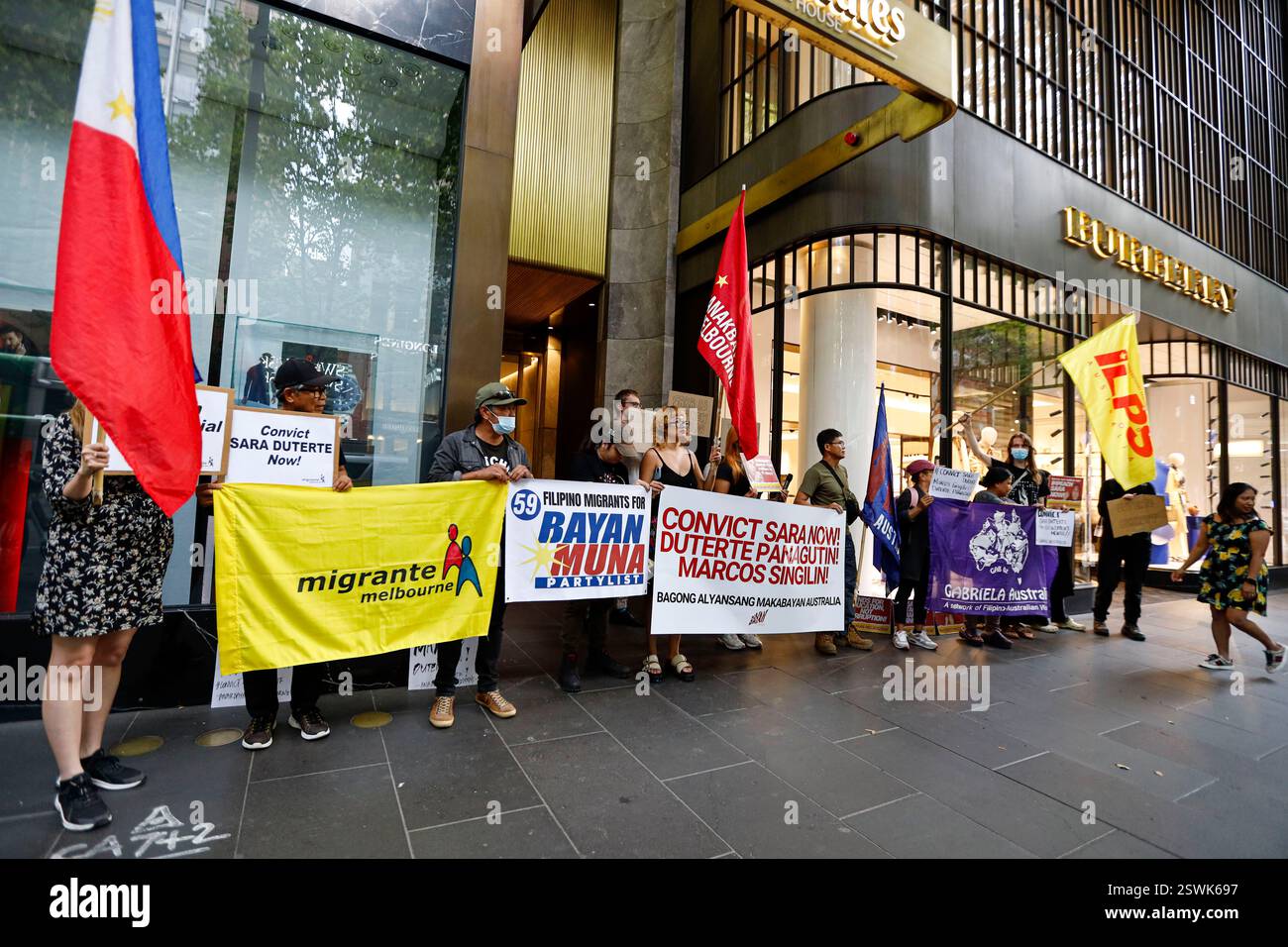 Protesters hold banners and placards during the Black Friday protest ...