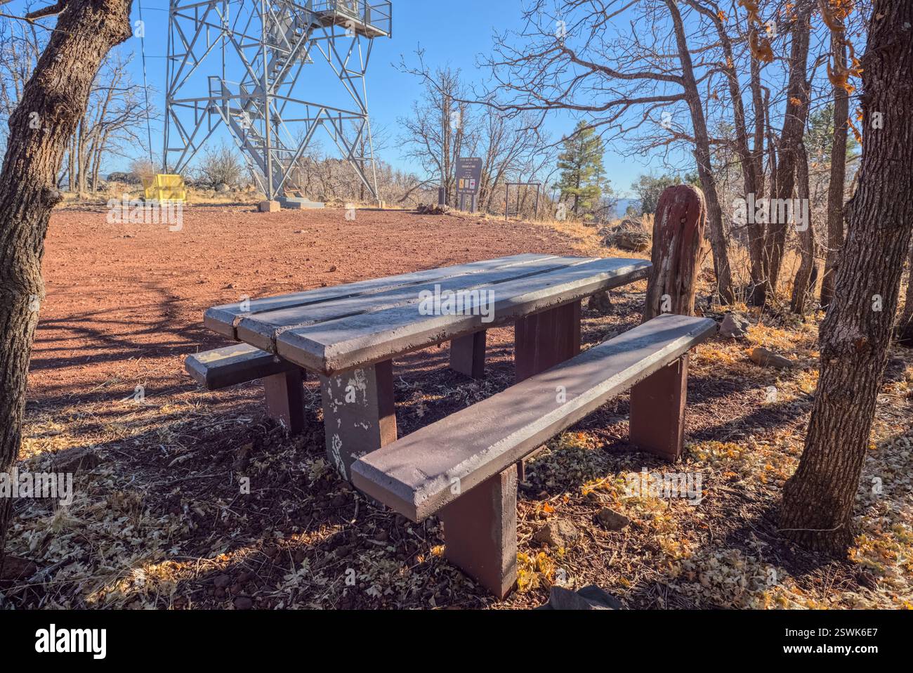 A picnic table beneath the Fire Watchtower on the summit of Apache Maid ...