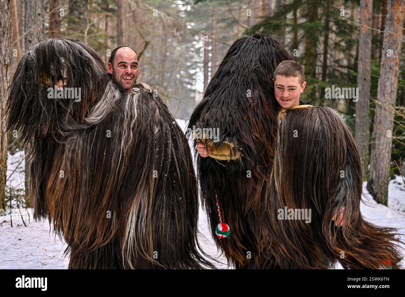 Traditional Kukeri performers dressed in thick long hair goat fur ...