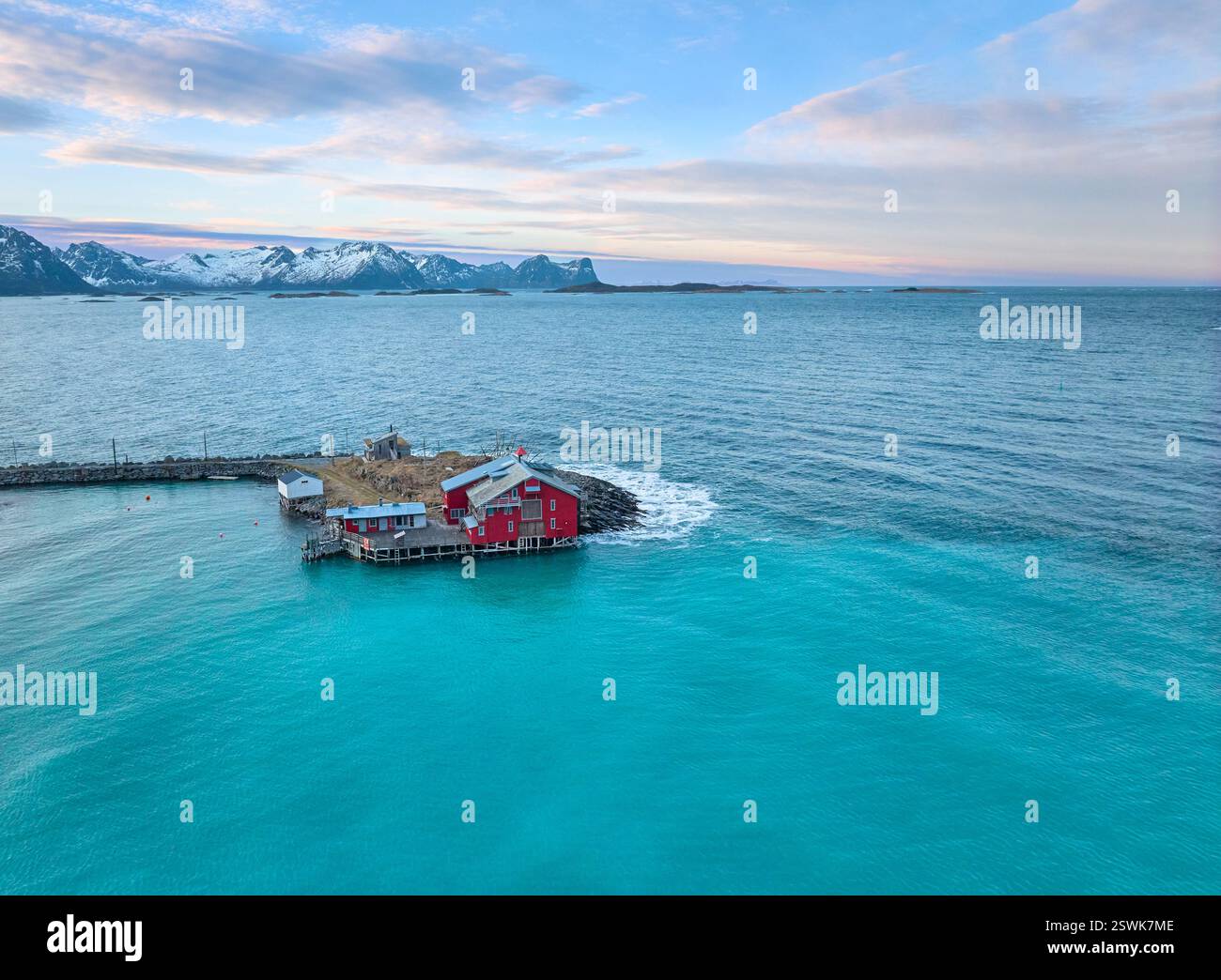 flight over coastal landscape in winter at Bøvika beach near Skaland on ...