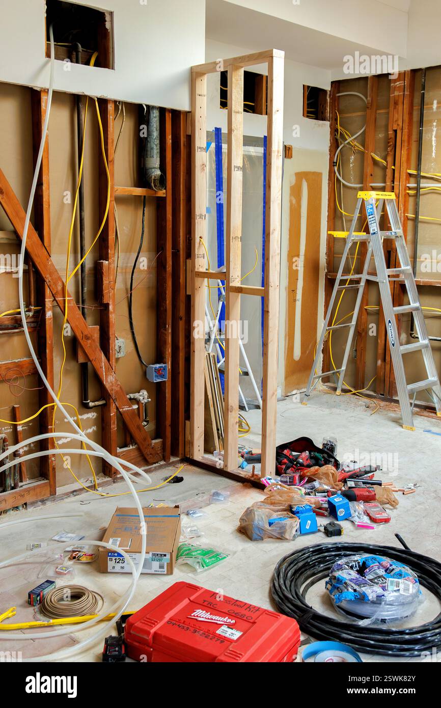 Rough plumbing and electrical installation inside kitchen, San Diego ...