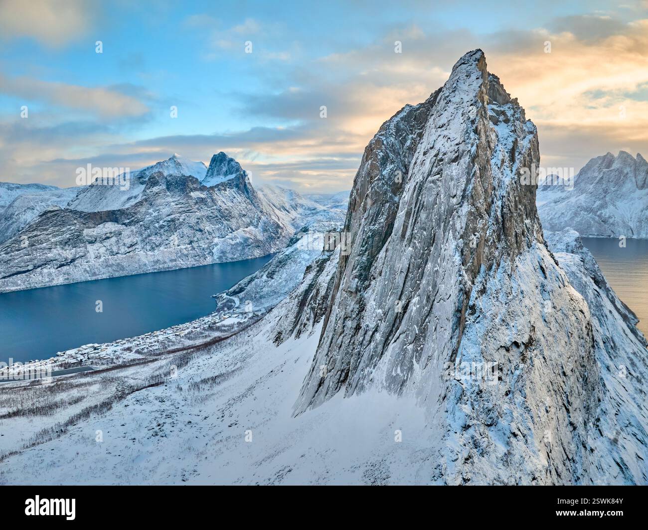Aerial photo of snowy Segla summit near Fjordgard, the most famous ...