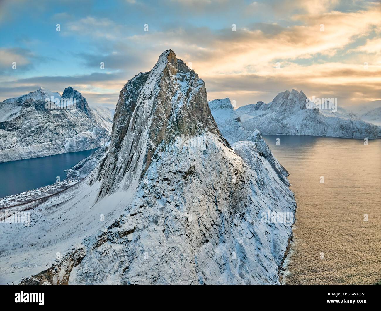 Aerial photo of snowy Segla summit near Fjordgard, the most famous ...