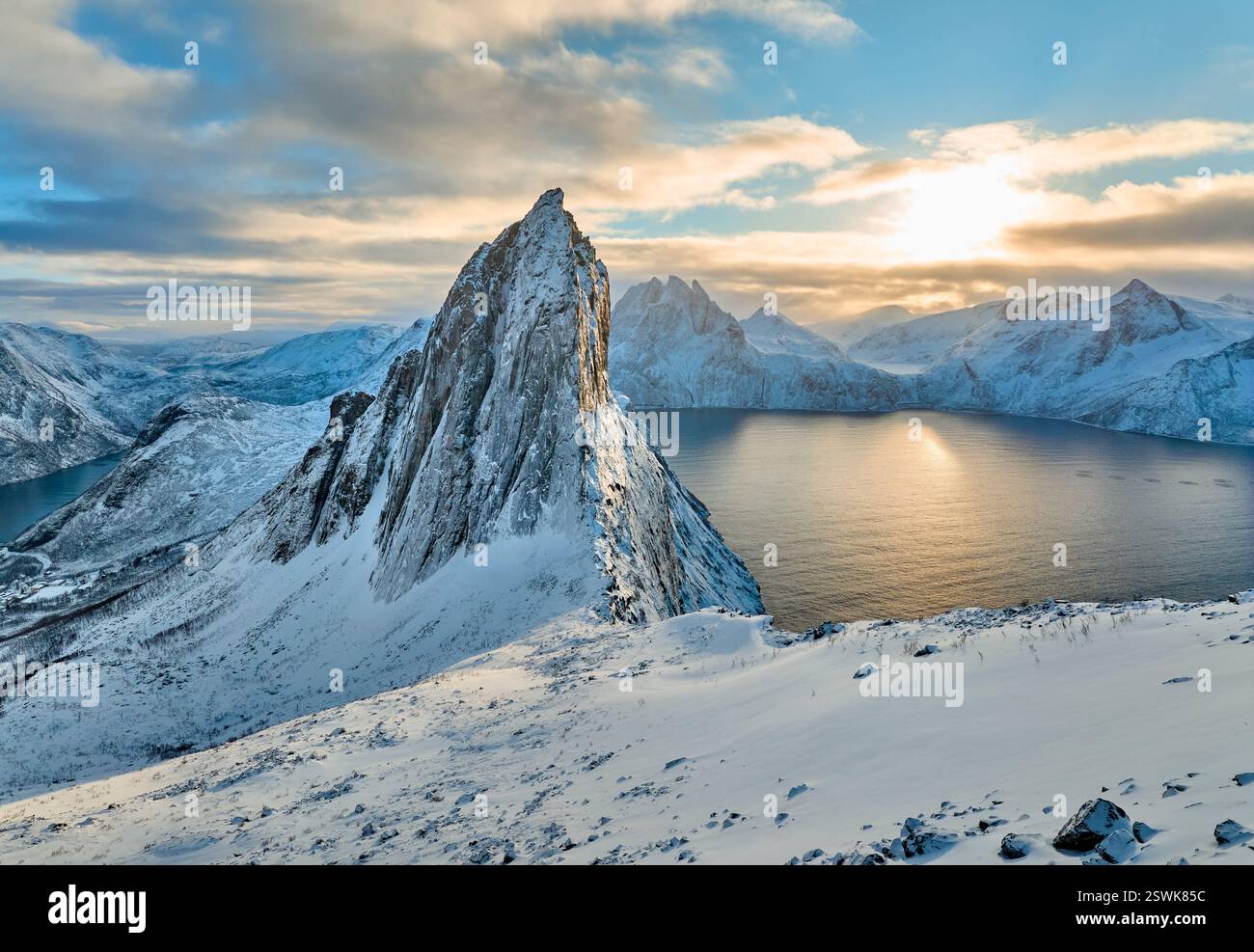 Aerial photo of snowy Segla summit near Fjordgard, the most famous ...