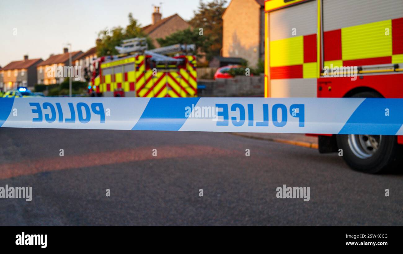 Two Scottish Fire and Rescue Service Fire Engines behind Police ...