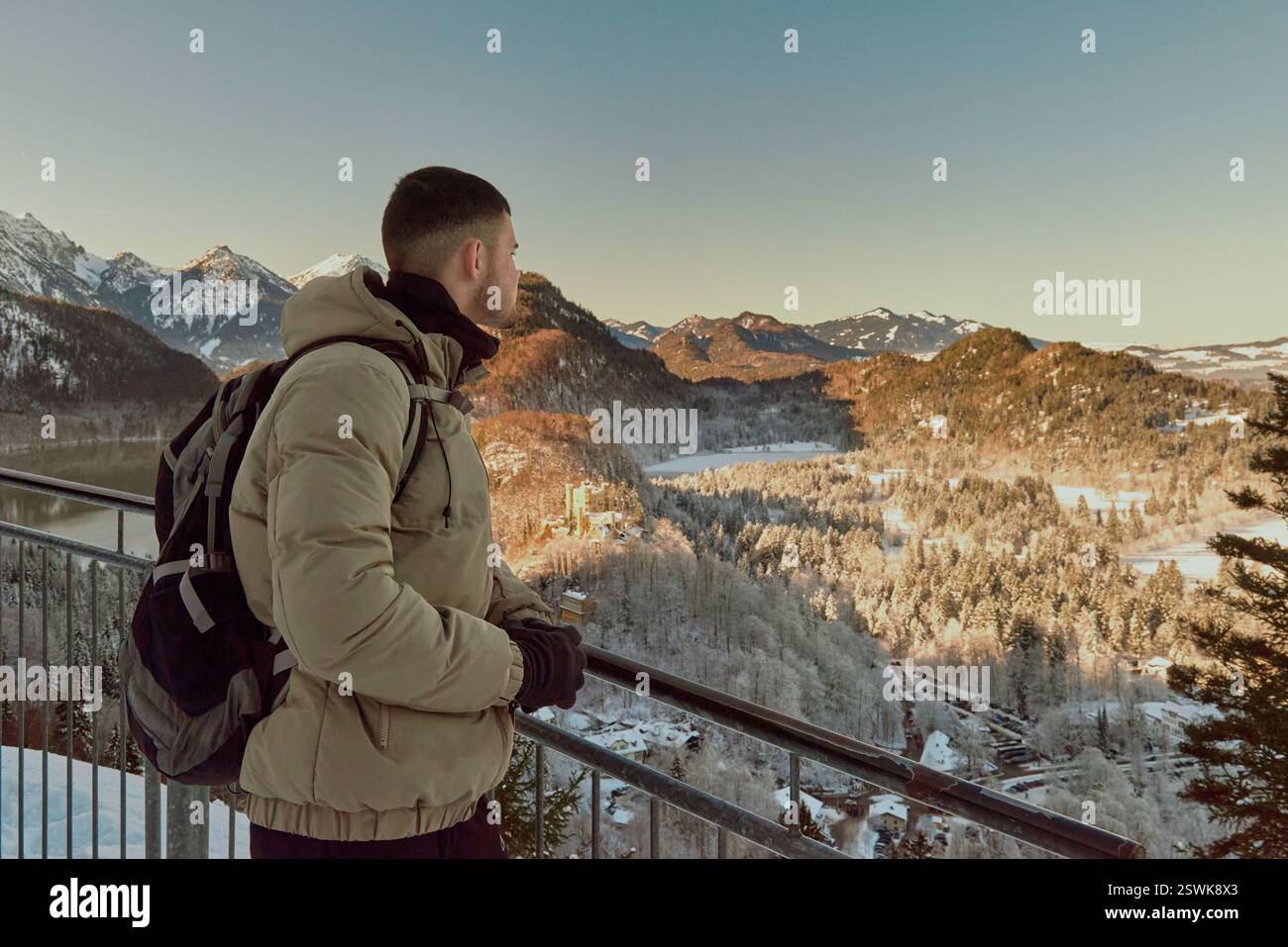 Serene Portrait of Man on Balcony Overlooking Majestic Icy Mountain ...