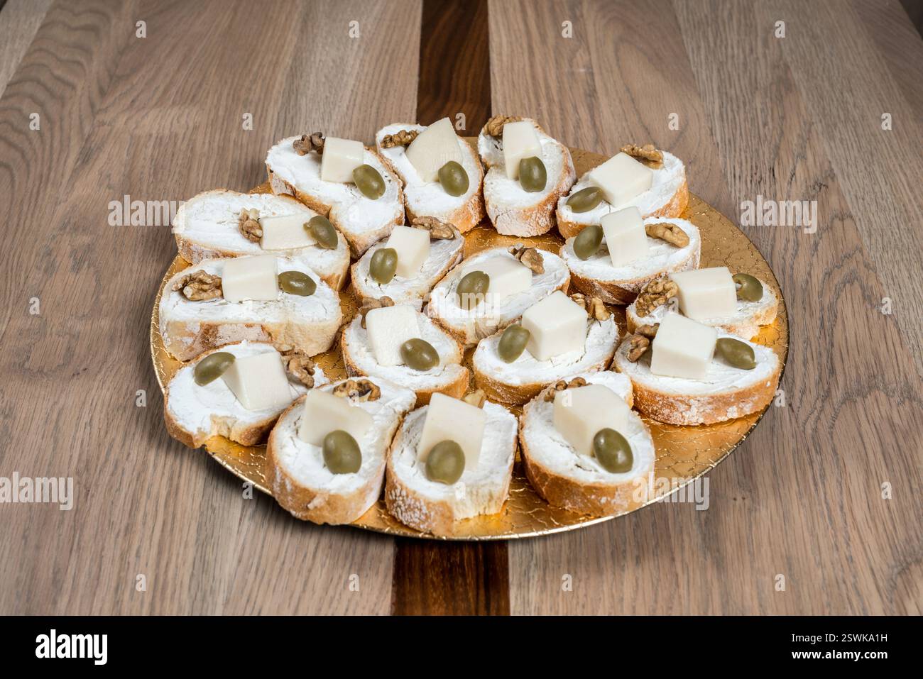 Artisanal cheese and grape canapés: Creamy spread on toasted bread ...