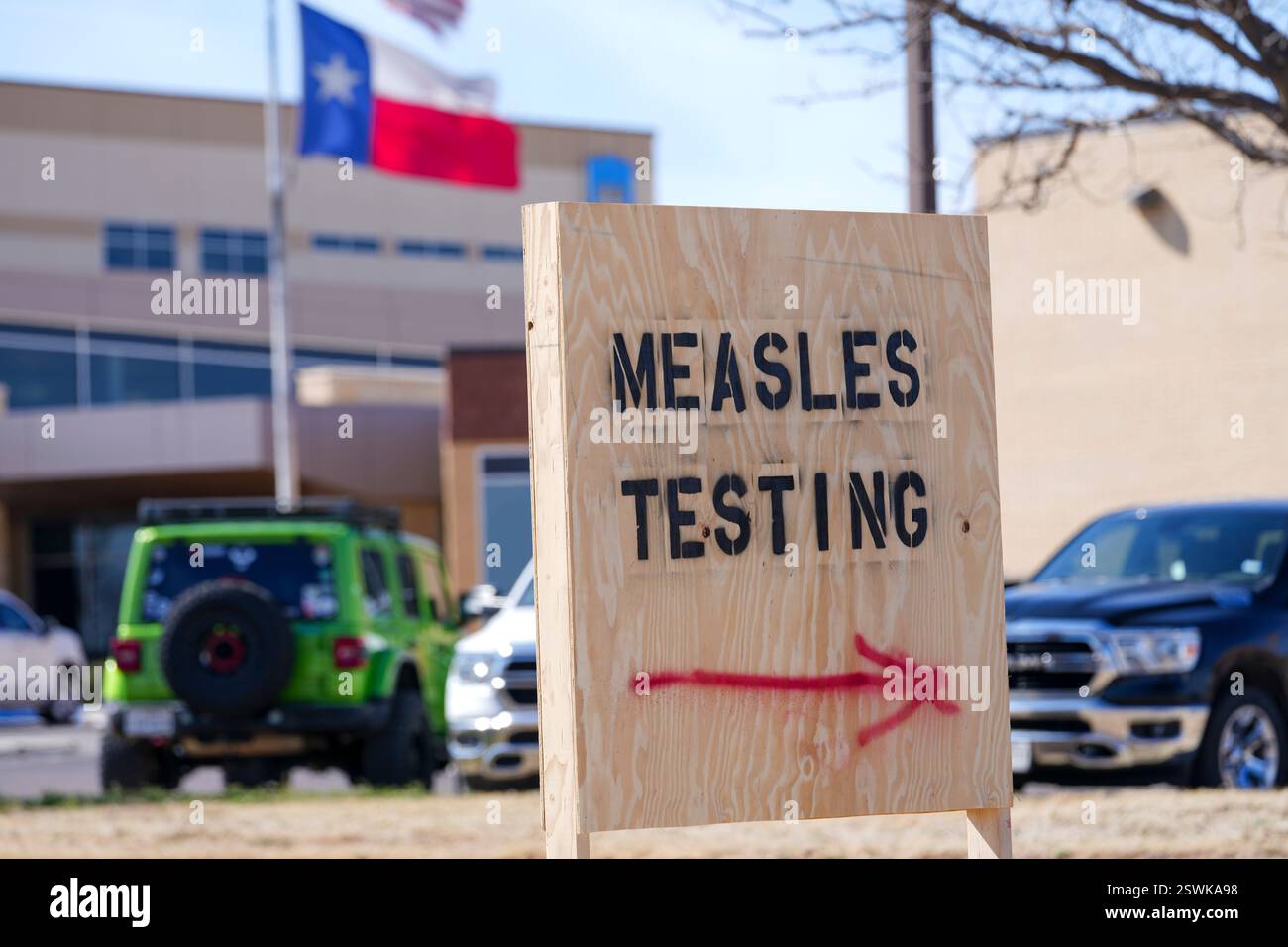 A sign is seen outside of Seminole Hospital District offering measles ...