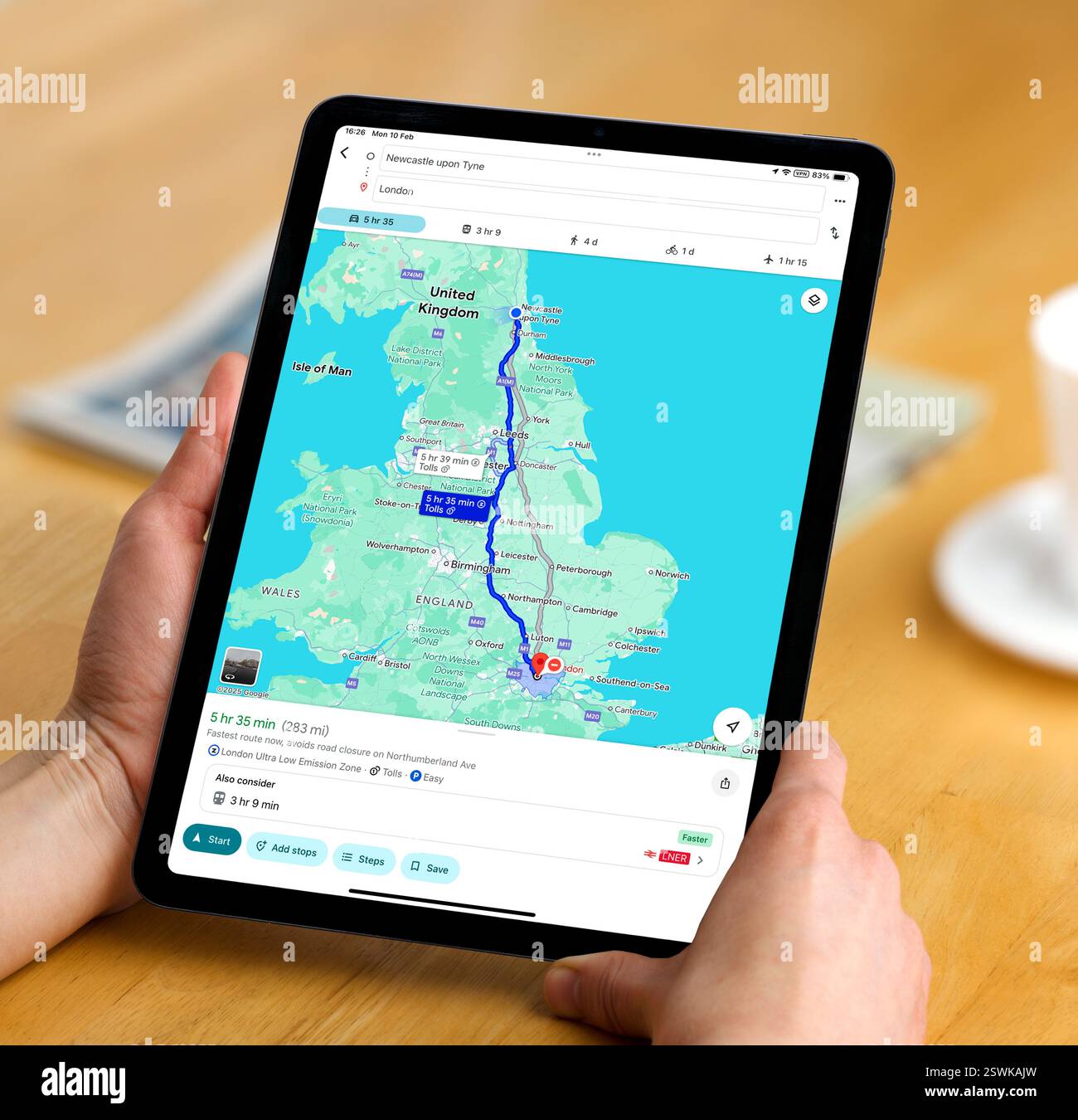 Looking at the Google Maps app on an Apple iPad Stock Photo - Alamy