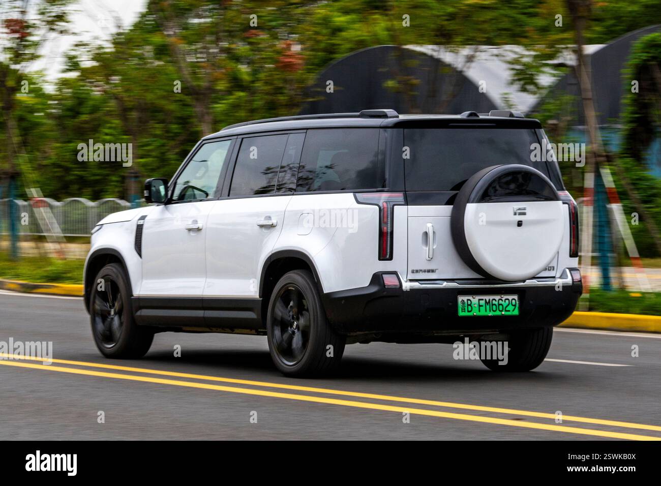 A Rox 01 extended range EV being driven on a test drive in Shanghai ...