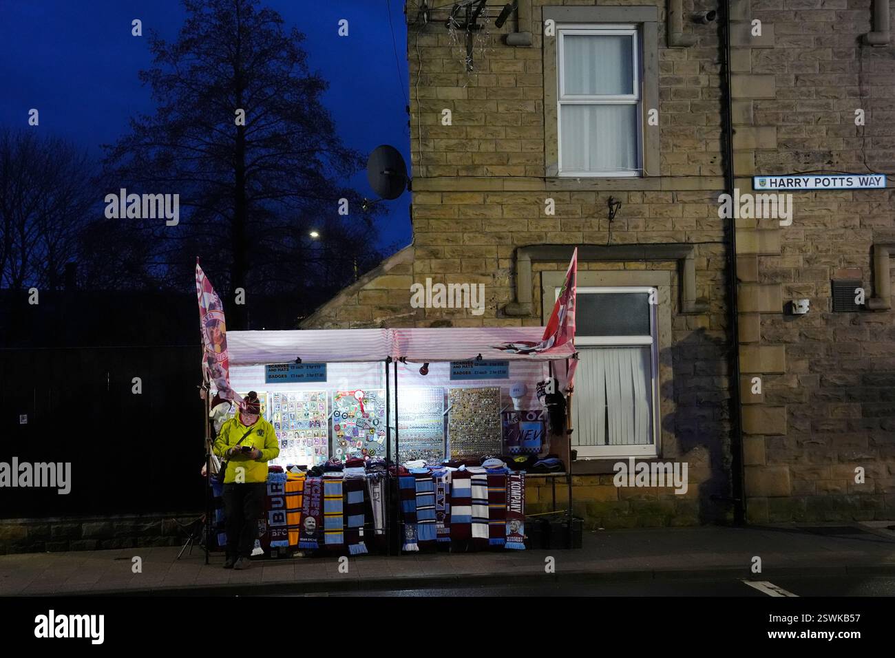 A scarf seller on Harry Potts Way ahead of the Sky Bet Championship ...