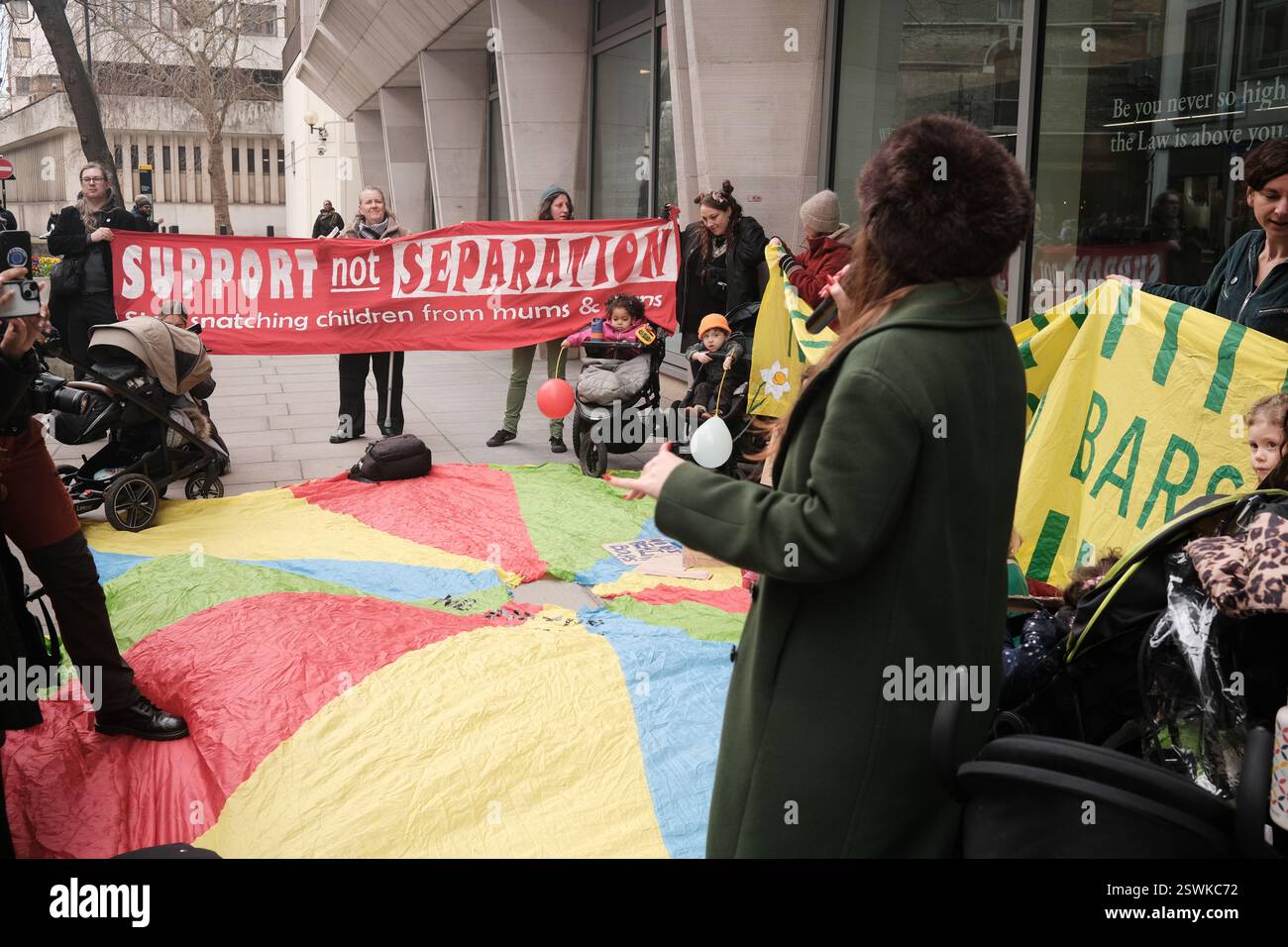 London, UK. 21st February, 2025. Protestors gather at the Ministry of ...