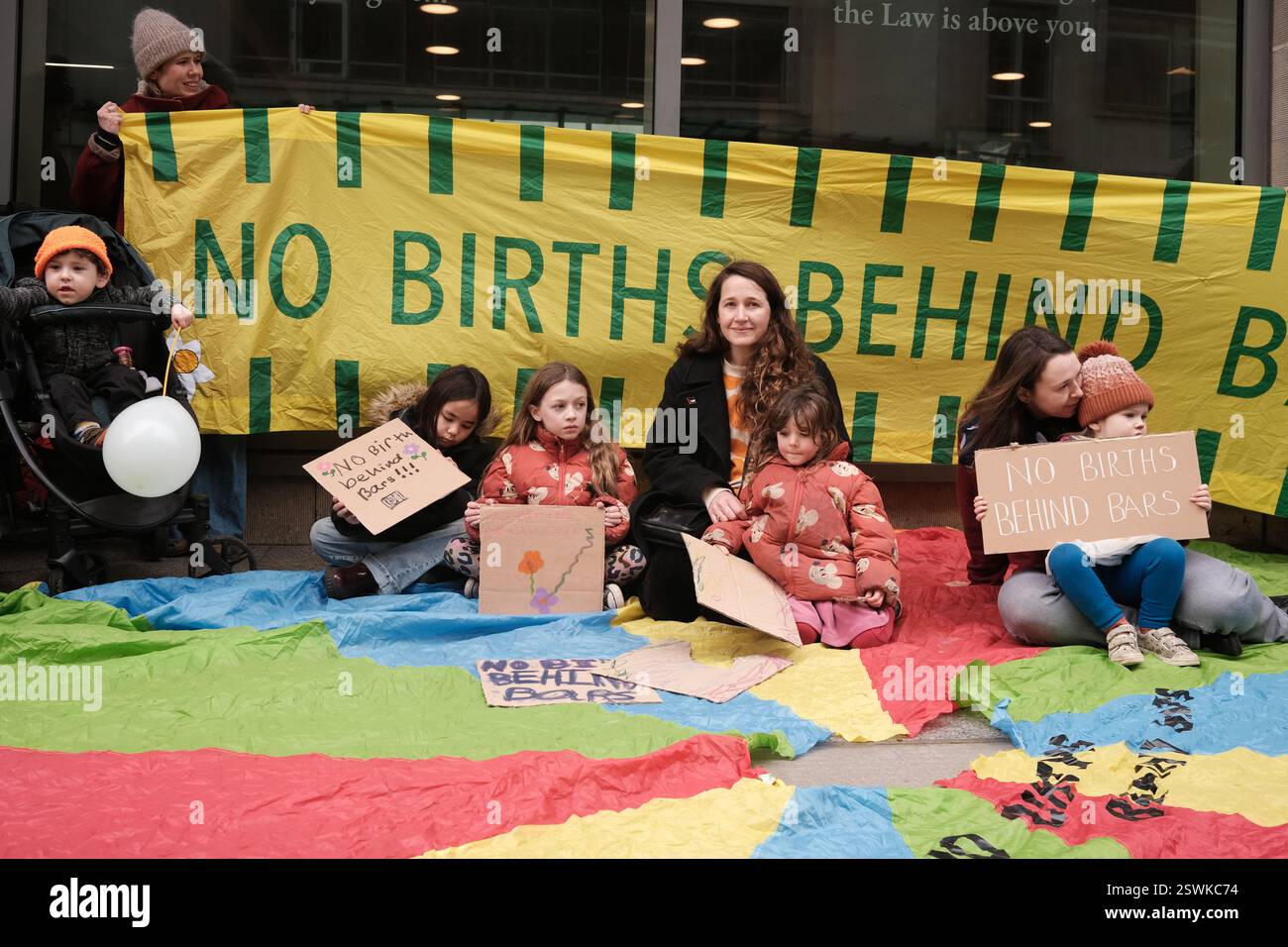London, UK. 21st February, 2025. Protestors gather at the Ministry of ...