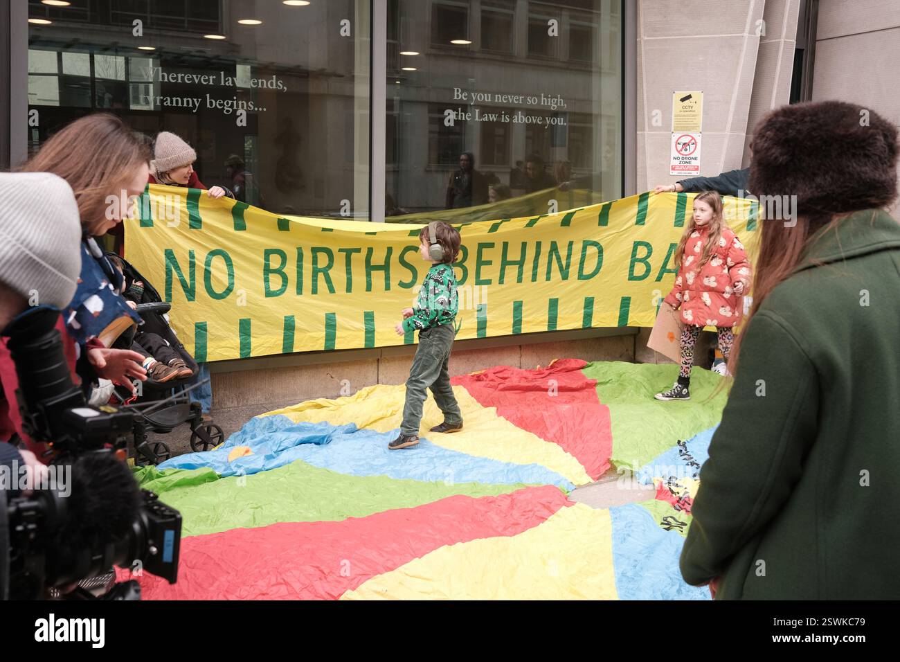 London, UK. 21st February, 2025. Protestors gather at the Ministry of ...