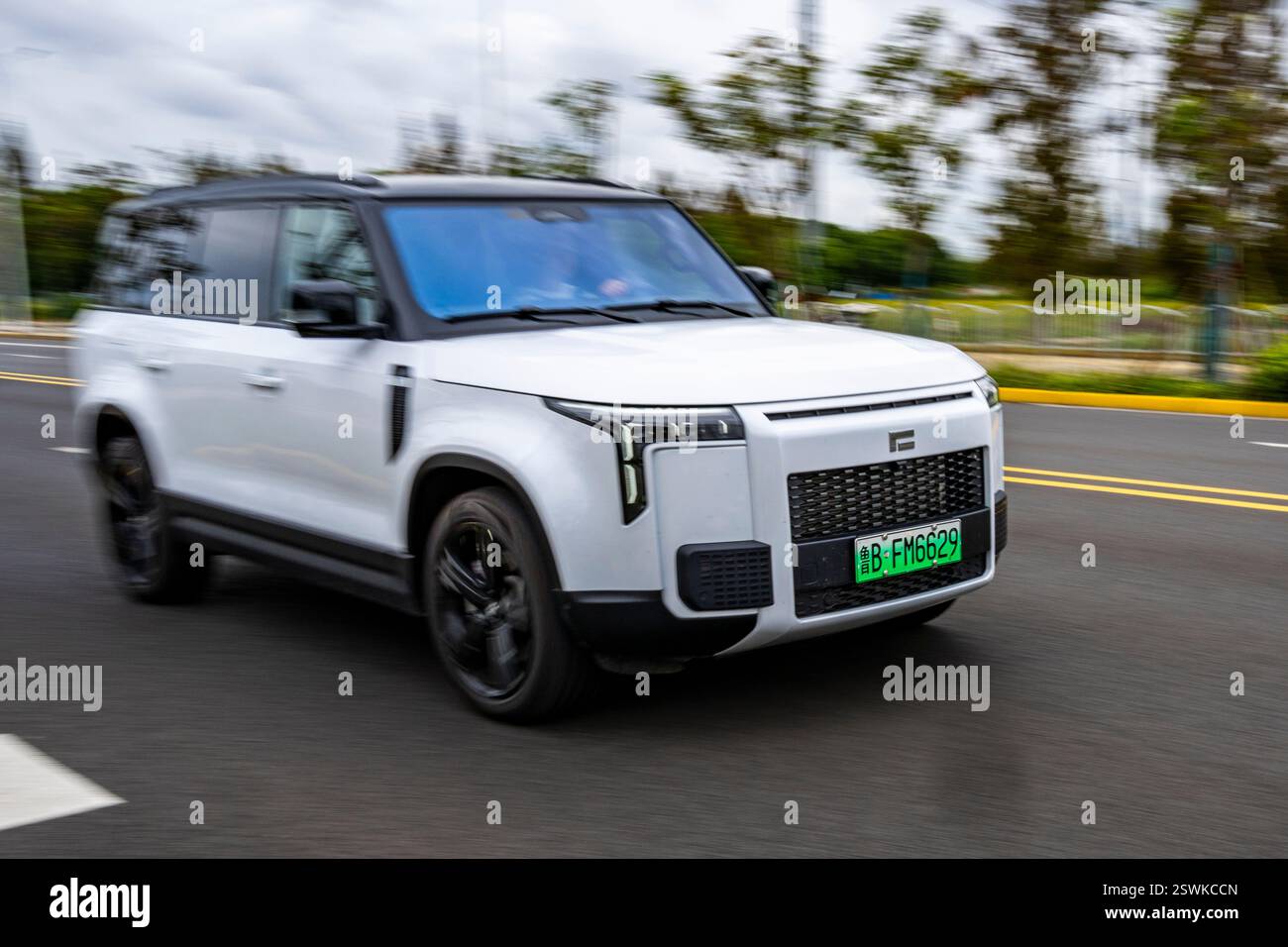A Rox 01 extended range EV being driven on a test drive in Shanghai ...
