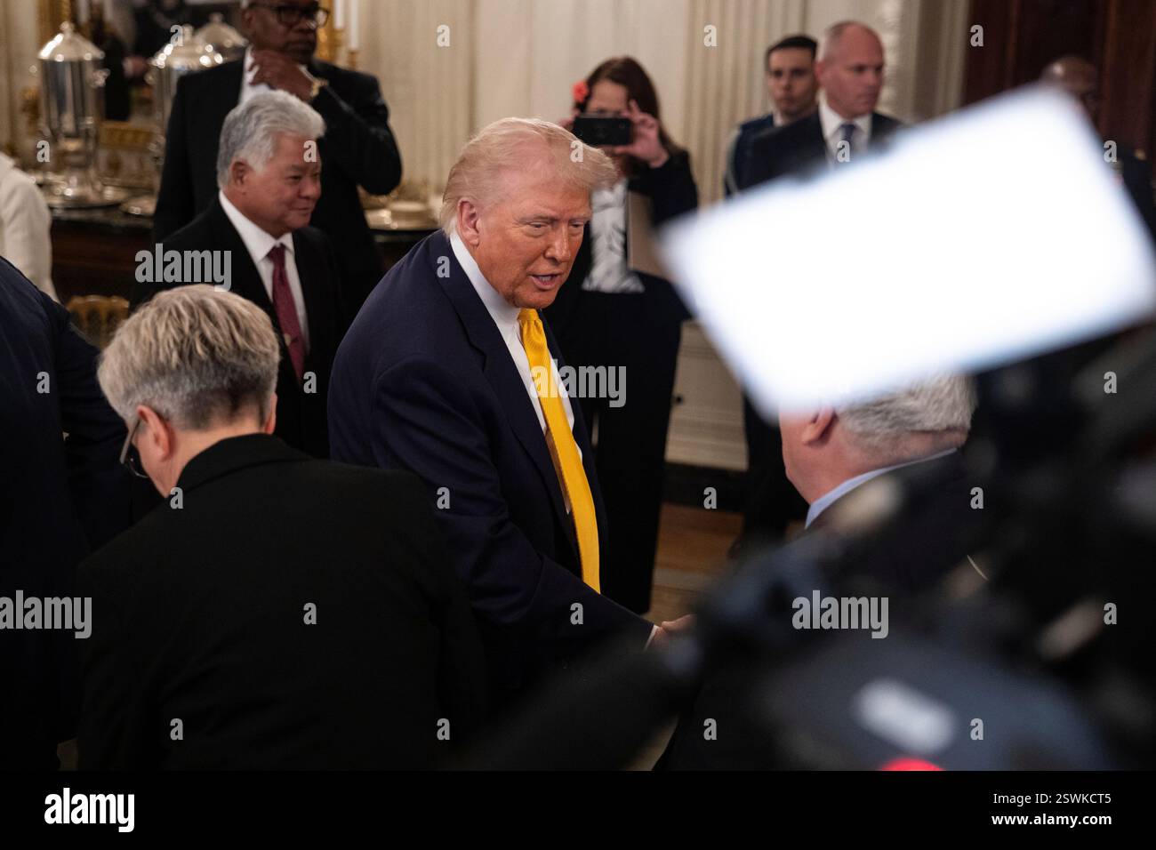 President Donald Trump departs after delivering remarks during a ...