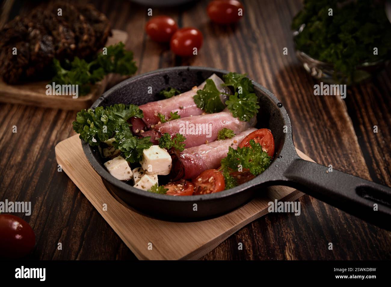 The photo shows a close-up of a frying pan with a finished dish Stock ...