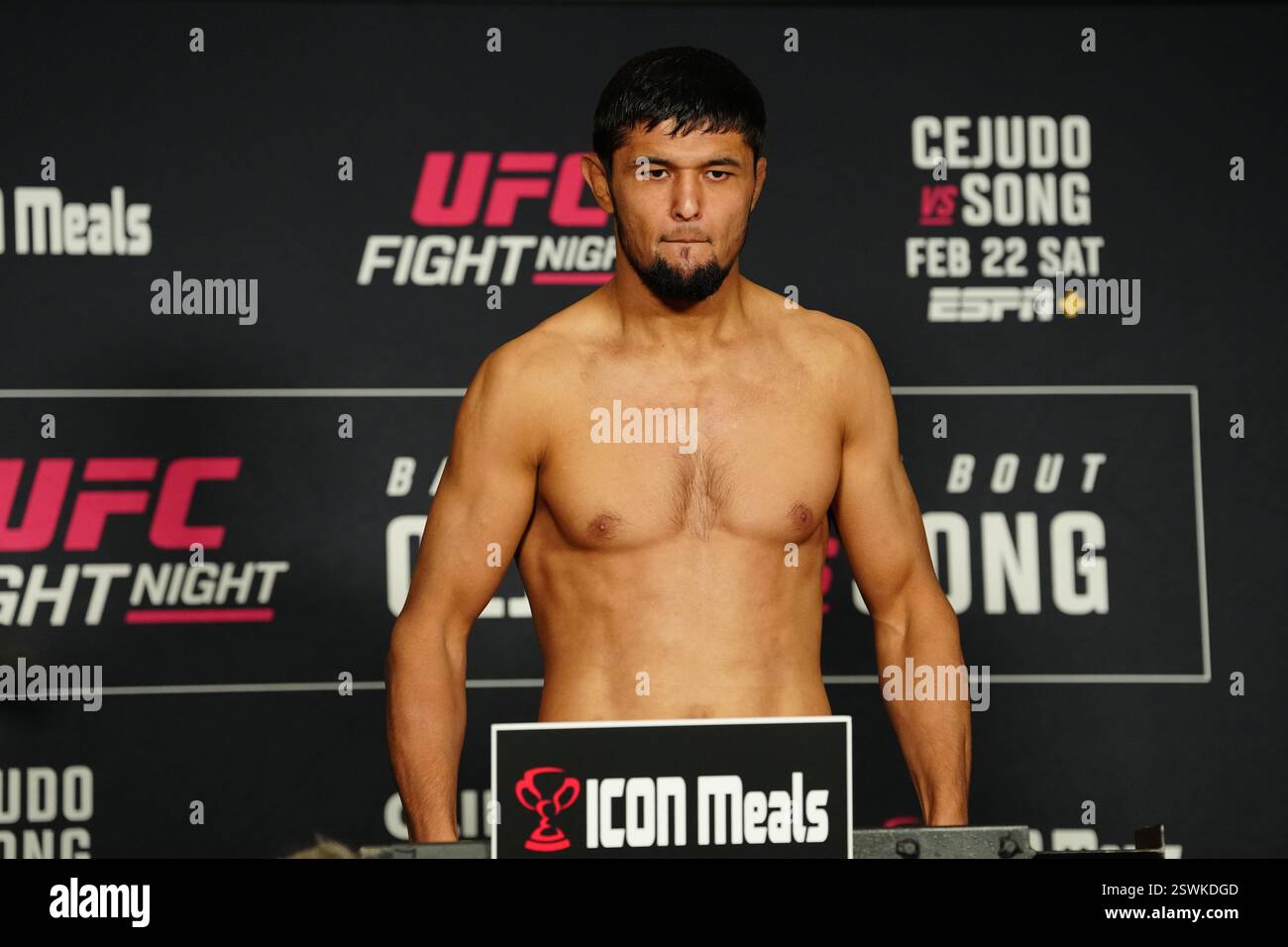 SEATTLE, WA - FEBRUARY 21: Nursulton Ruziboev steps on the scale for ...