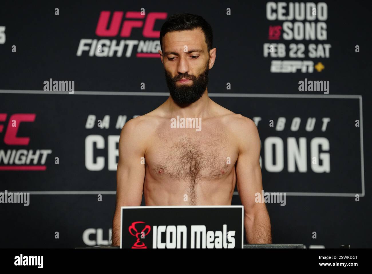 SEATTLE, WA - FEBRUARY 21: Javid Basharat steps on the scale for the ...