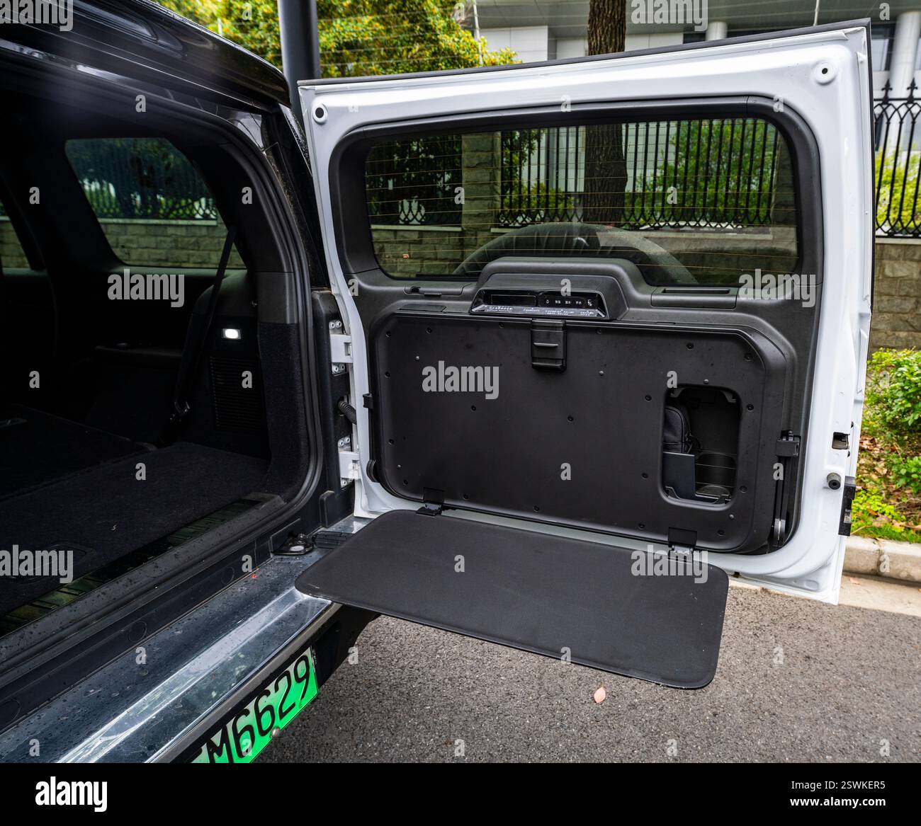 Camping tools setup on the tailgate of a Rox 01 extended range EV ...