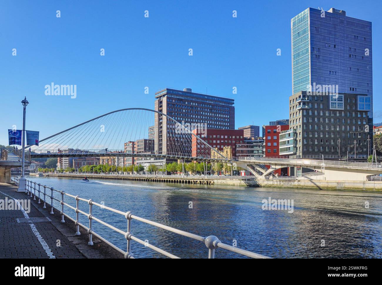 Gliding Elegance: Bilbao's Iconic Zubizuri Bridge Stock Photo - Alamy