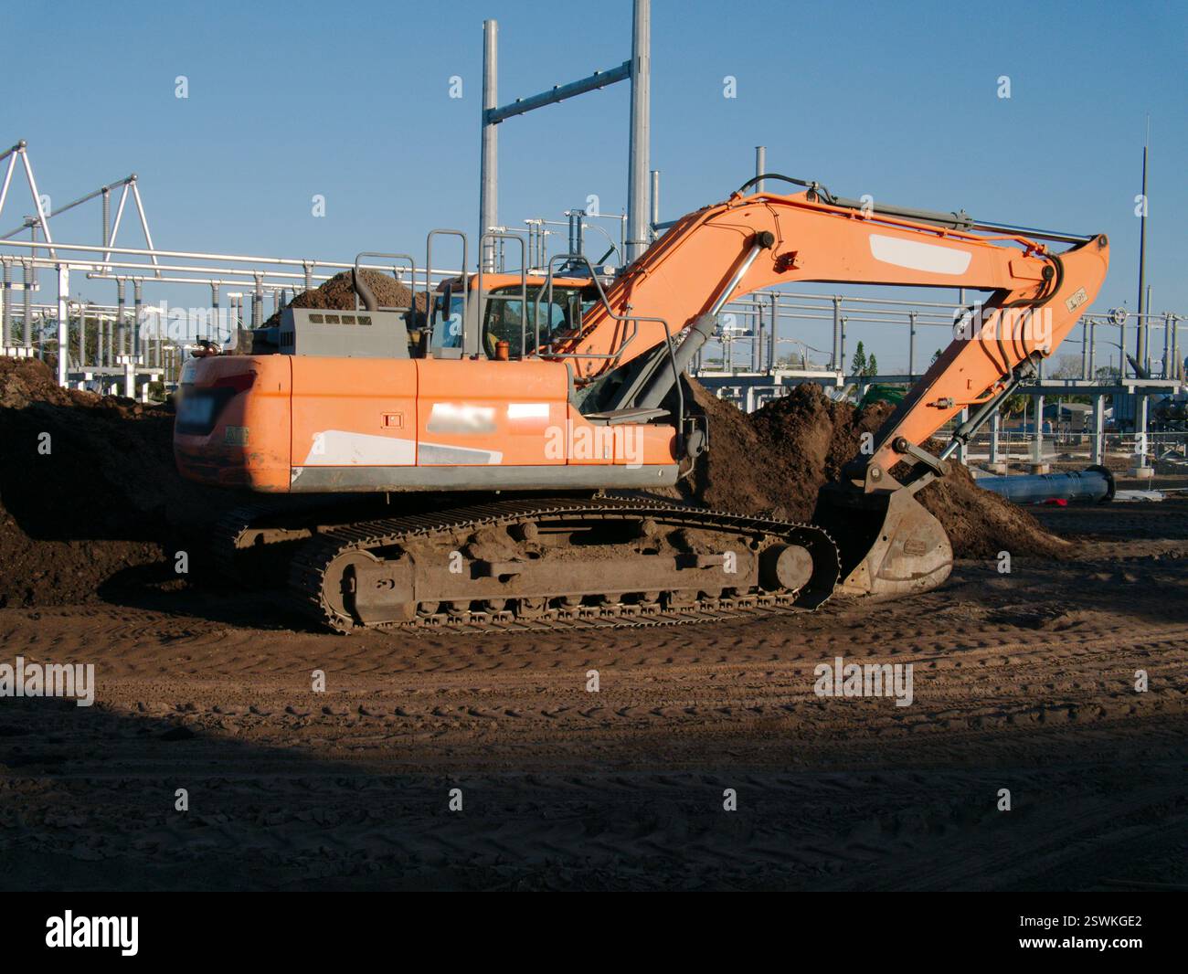 Wide view at construction site of Electric Substation View over dirt ...