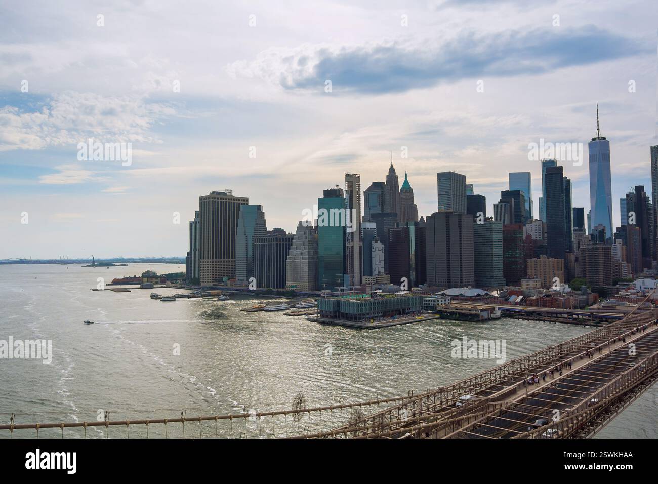 Cloudy day showcases New York City Manhattan skyline waterfront, with ...