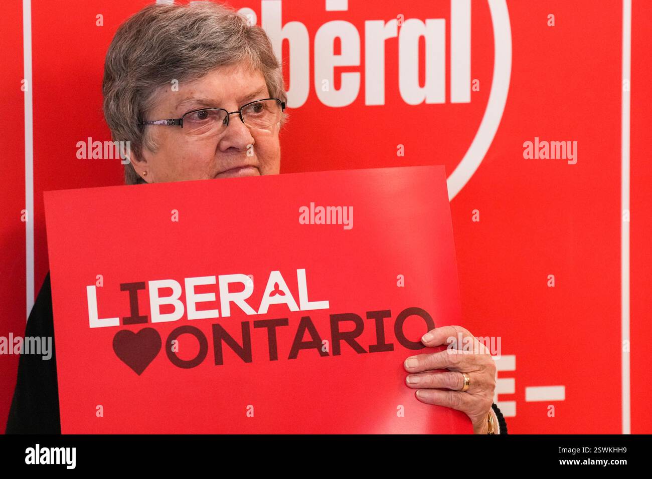 A supporter holds a sign as he Ontario Liberal leader Bonnie Crombie ...