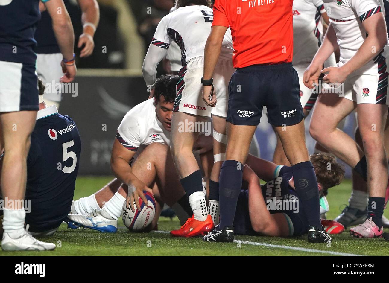 England's Kepu Tuipulotu scores their side's second try of the game ...