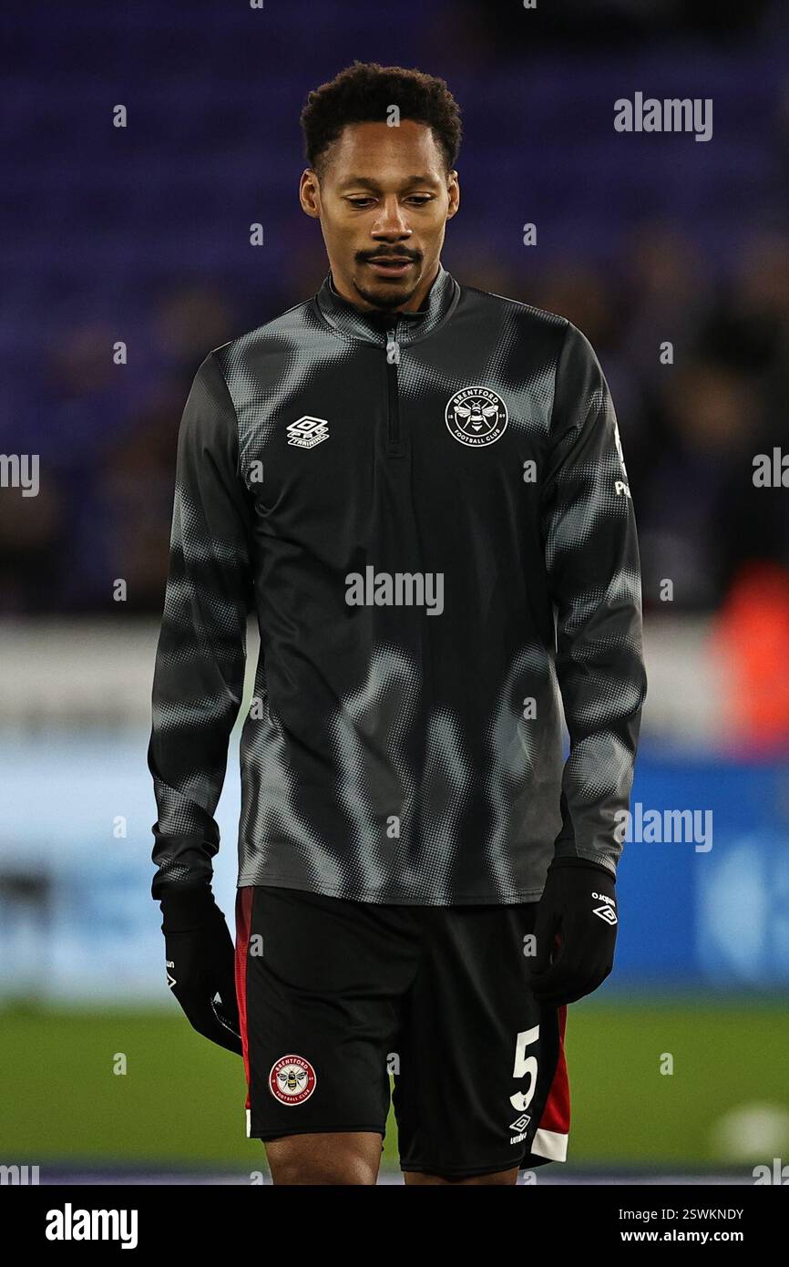 Ethan Pinnock of Brentford warms up ahead of the Leicester City FC v ...