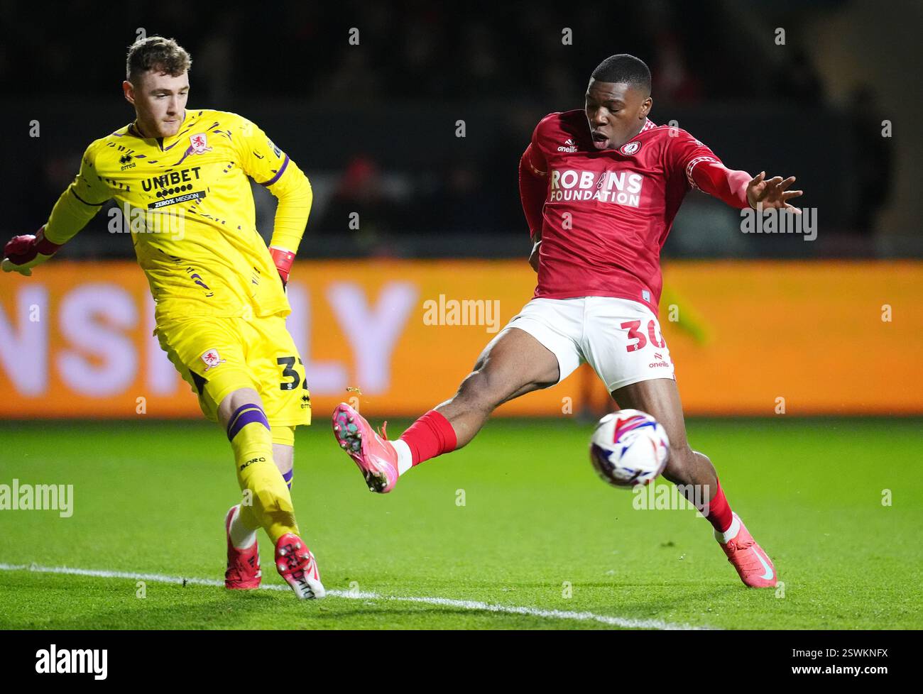 Bristol City's Sinclair Armstrong (right) closes down Middlesbrough ...