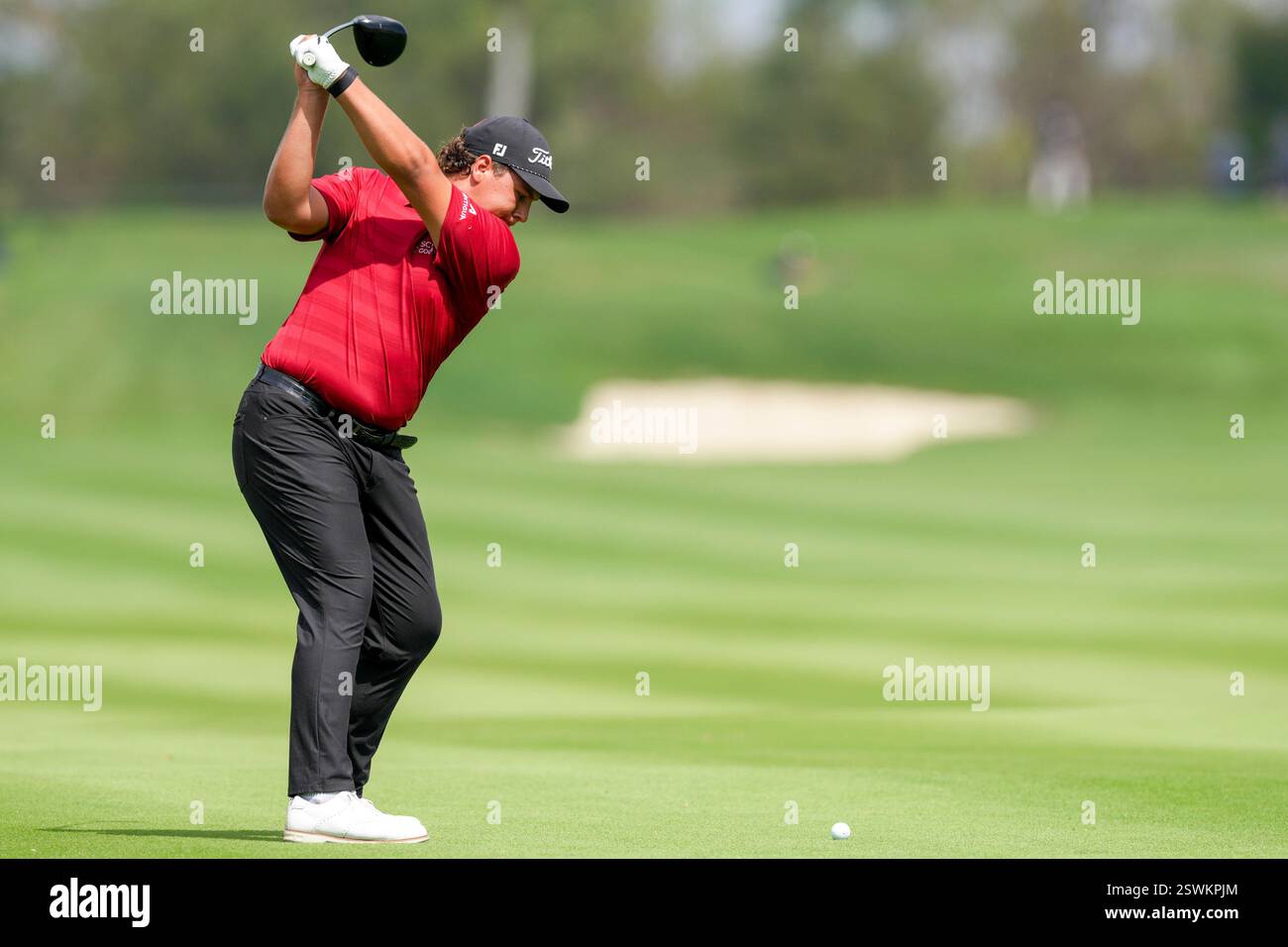 Aldrich Potgieter, of South Africa, hits on the 12th hole fairway ...