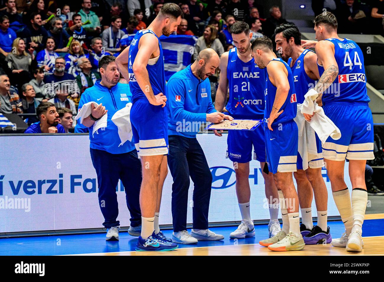 Greek coach Vassilis Spanoulis, 3rd left, speaks with players during ...