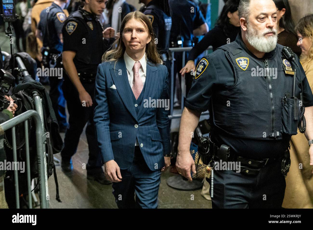 Chelsea Manning walks in the hallway at Manhattan state court on Friday ...