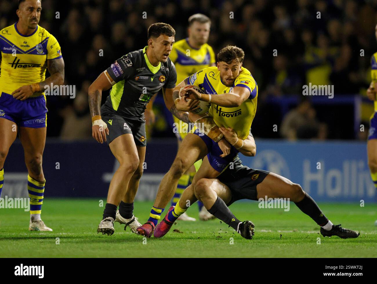 Warrington Wolves' Matty Ashton is tackled during the Betfred Super ...